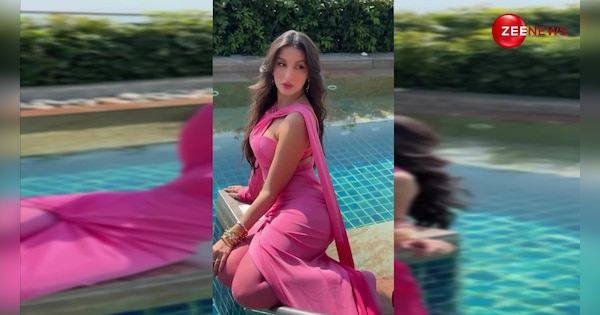 sensational nora fatehi tempting photoshoot went viral give poses near ...