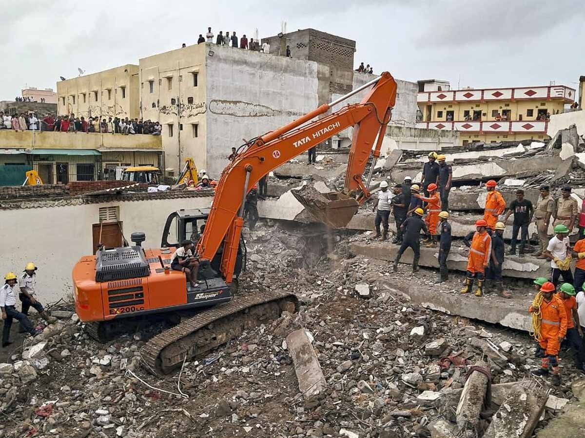 7 dead many trapped after fivestorey building collapses in Gujarats ...