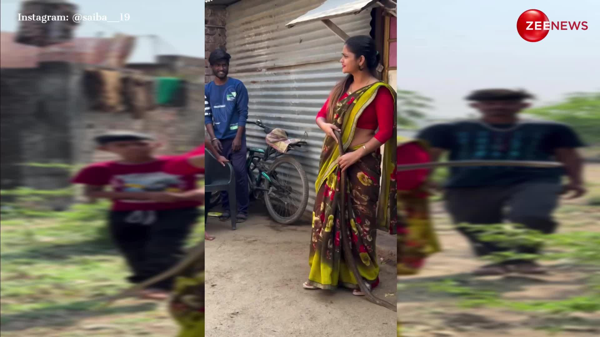 beautiful woman in saree caught snake in viral video netizens says ...