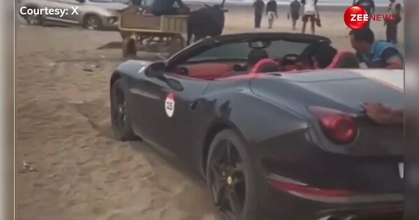 Luxury Ferrari car stuck in the sand on the beach bullock cart was ...
