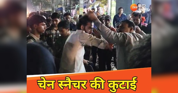 chain snatcher young man caught by people beaten badly than handed over ...