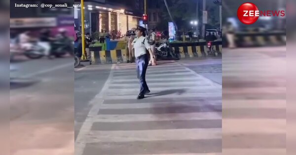 traffic police woman aware people for traffic signals while singing a ...
