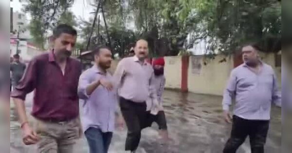 meerut dm inspects waterlogged city on foot after heavy rain walks in 2 ...