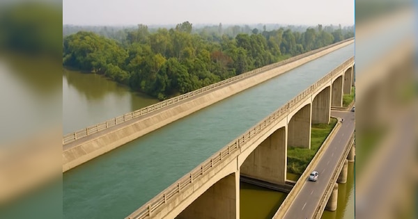 Have you ever seen that there is river flowing below and canal above ...
