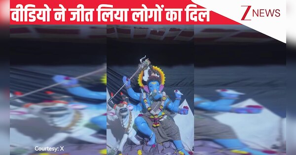 cute little girl praying for ganpati bappa in heavy rain innocence wins ...