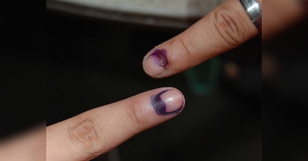 indelible ink voting history and science applying on finger during ...
