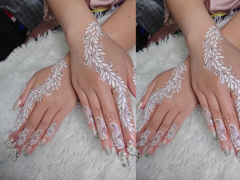 Apply white mehndi designs to give a new touch to your hand on Eid ...