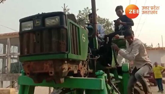 Farmer desi jugaad video makes 10 feet high tractor crowd gathers to ...
